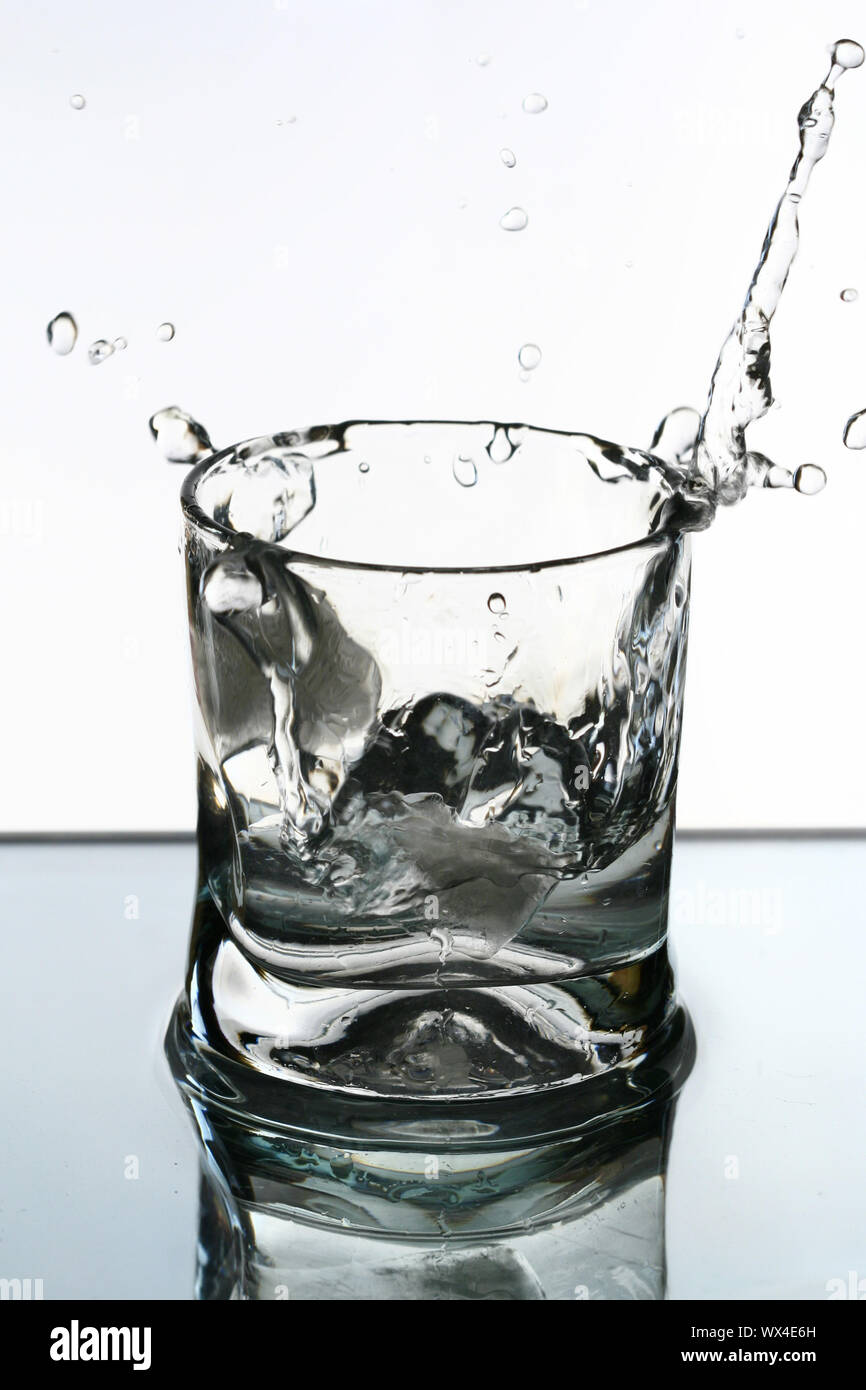 vodka alcohol elegant splash bar background Stock Photo - Alamy