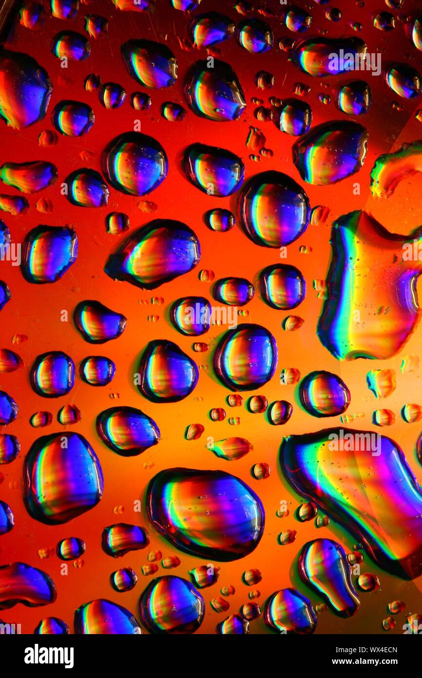 colored water drops macro close up Stock Photo - Alamy