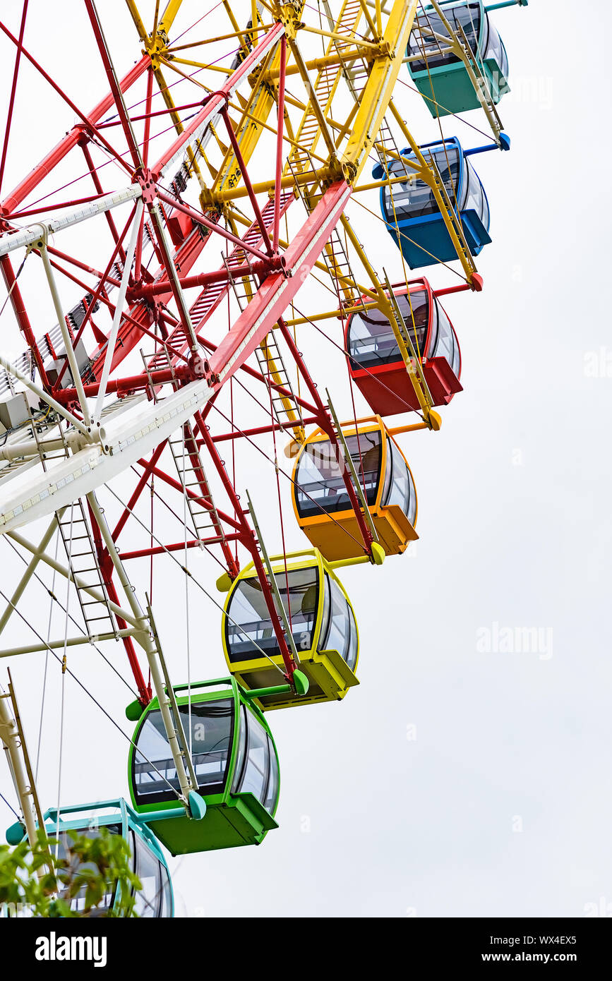 amusement park observation wheel colored cabs Stock Photo - Alamy