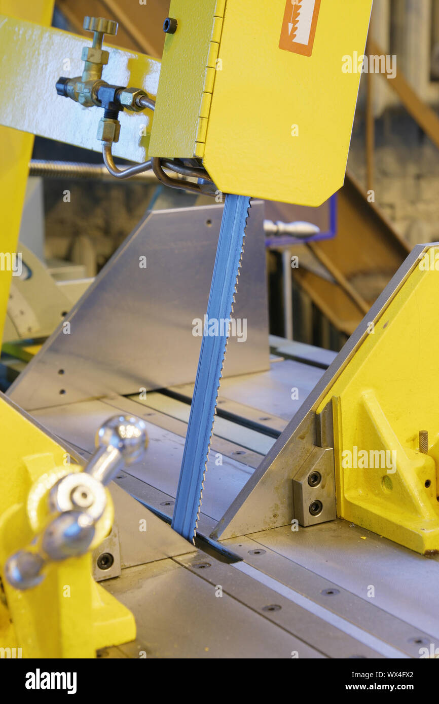 metalworking CNC Metalcutting the equipment saws cuts metal Stock Photo ...