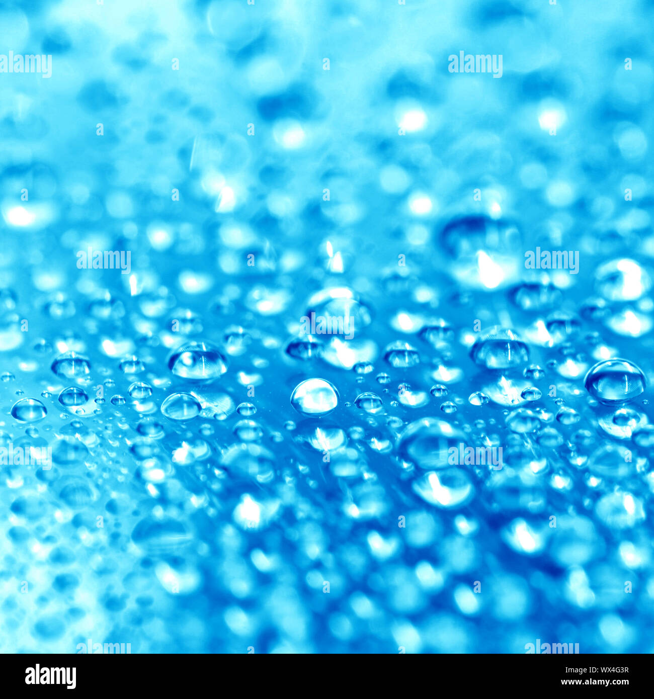 clean blue waterdrops macro background Stock Photo - Alamy