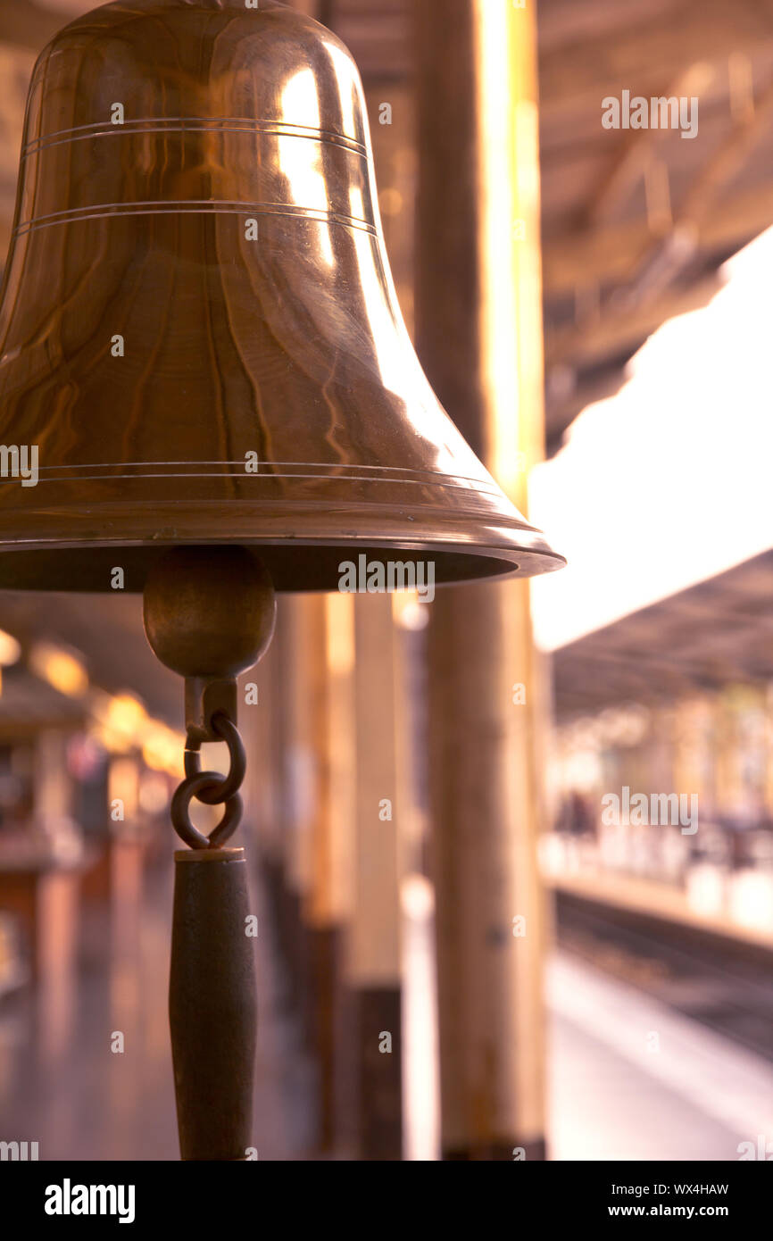 old bell in train station with sunrise light Stock Photo - Alamy