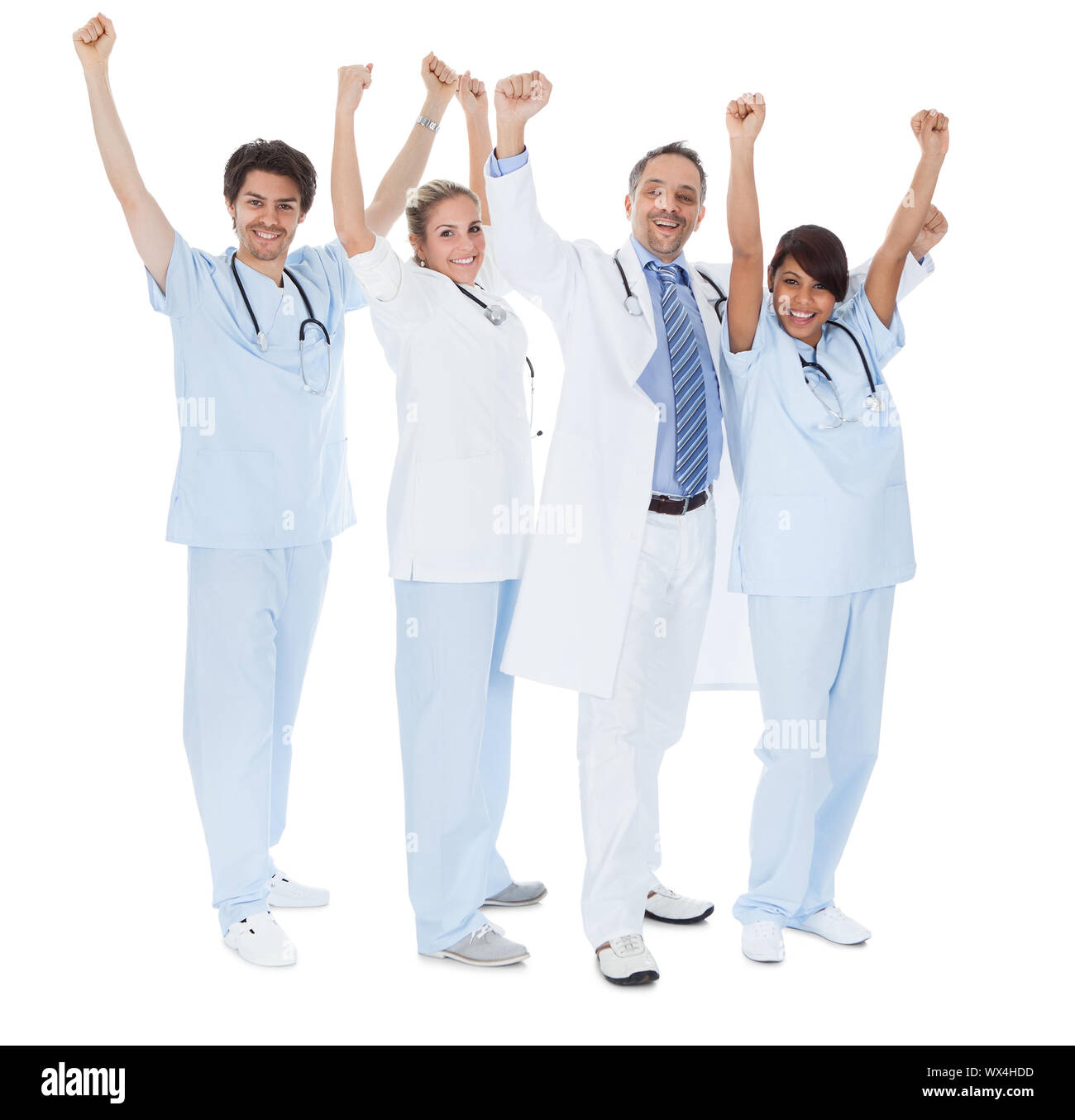 Group of doctors celebrating success. Isolated on white Stock Photo - Alamy