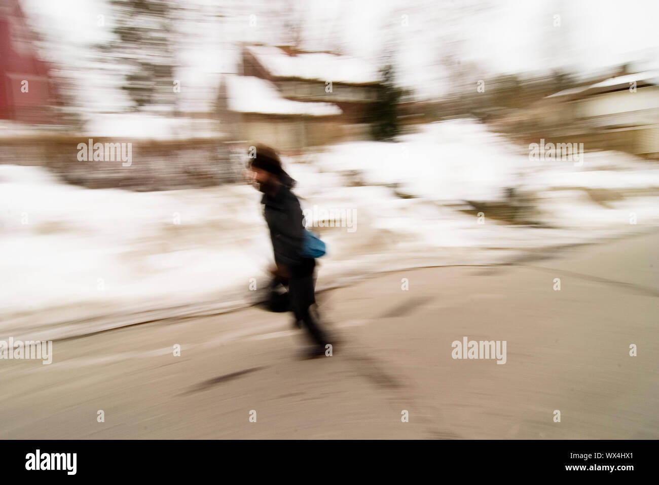 A motion blur image of a man running Stock Photo - Alamy