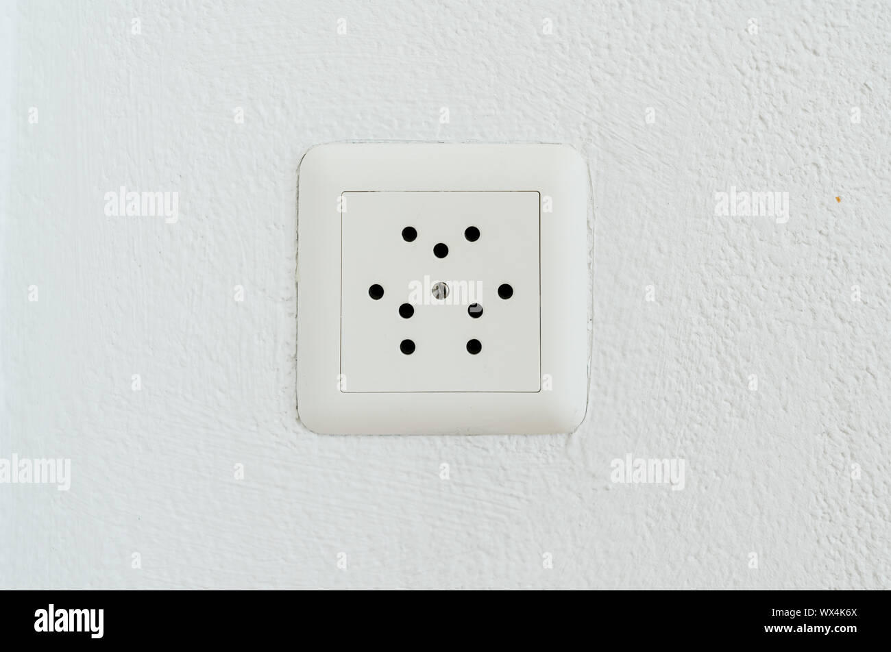 socket for Swiss plug close up on a white wall Stock Photo - Alamy