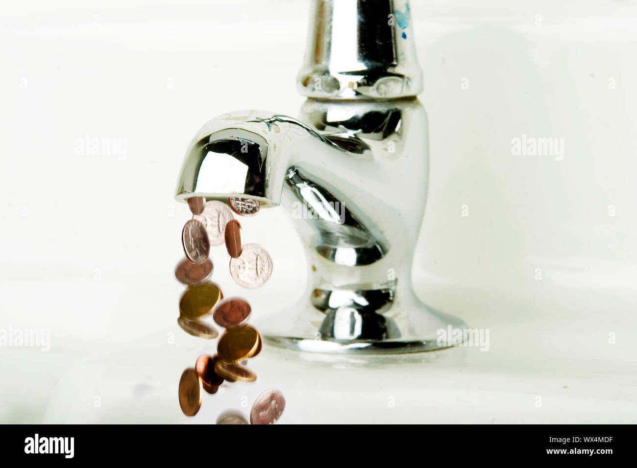 Close up water flowing out chrome hi-res stock photography and images ...