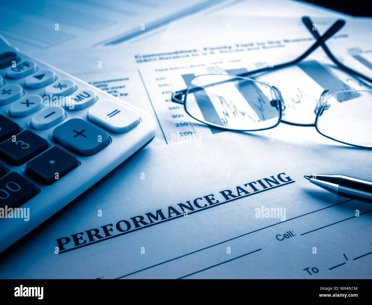 performance rating on the desk Stock Photo - Alamy