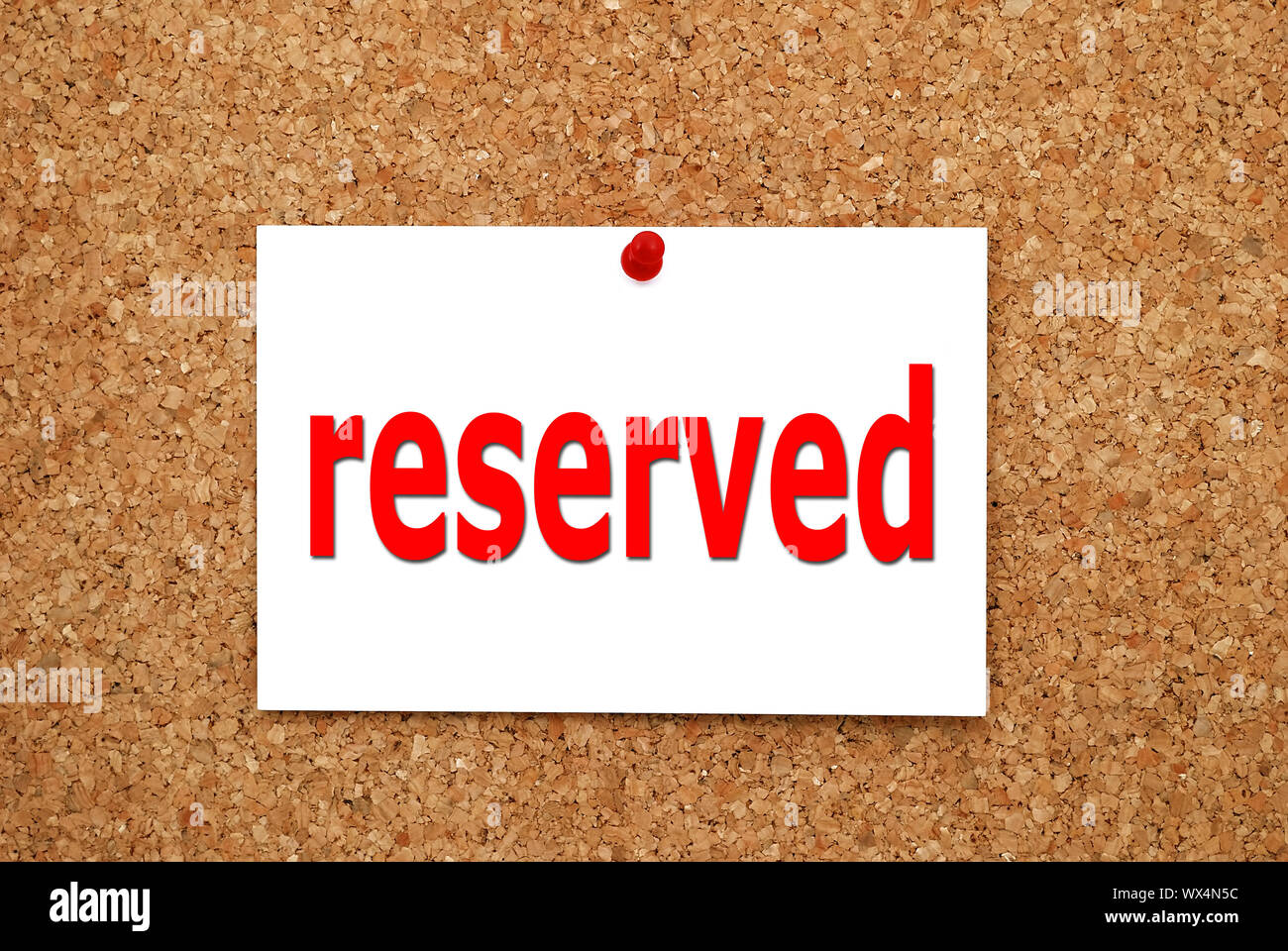 reserved sign attached to a cork board Stock Photo - Alamy