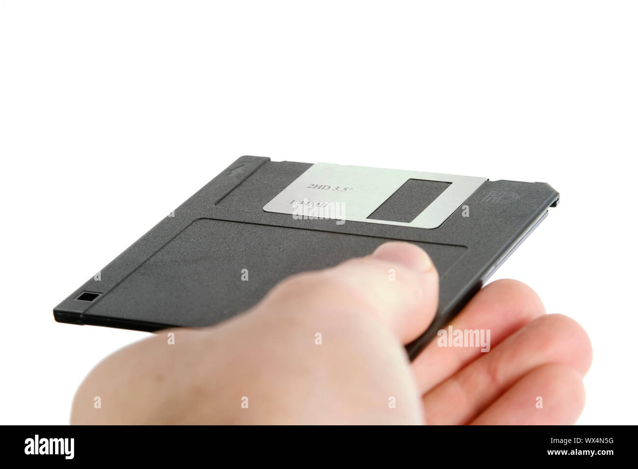 Hand holding floppy disk hi-res stock photography and images - Alamy
