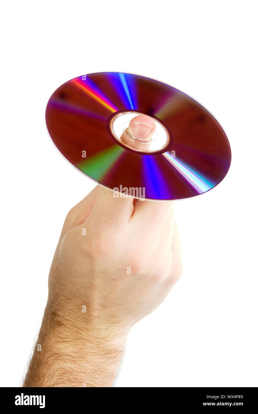 A male hand holding a cd on one finger. Isolated on white with clipping ...