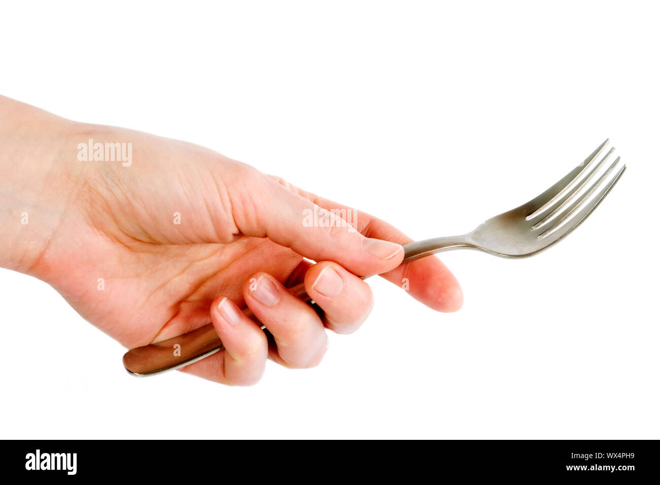 A fork being held by a womans hand Stock Photo - Alamy