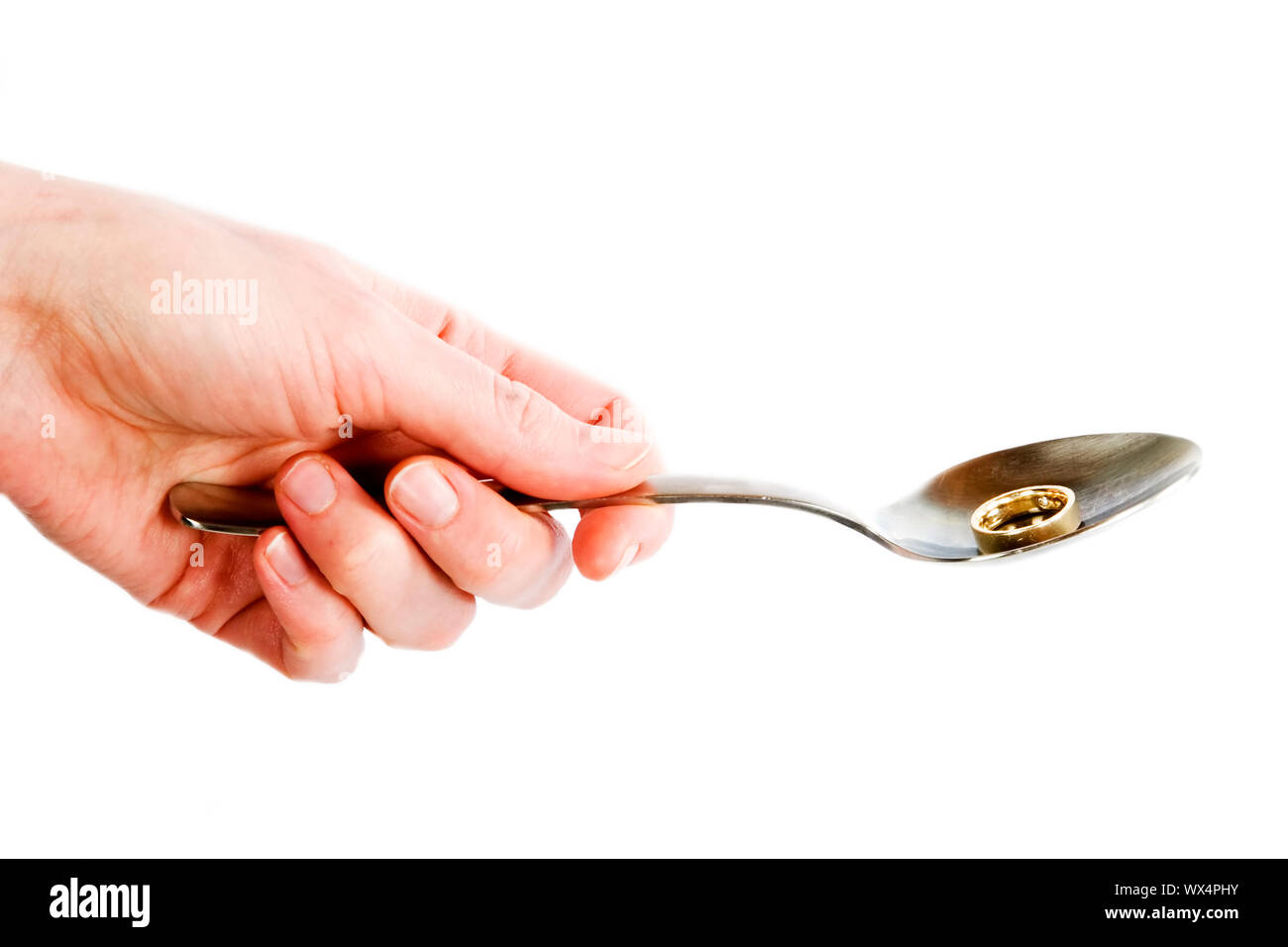 Spoon in Hand Stock Photo - Alamy