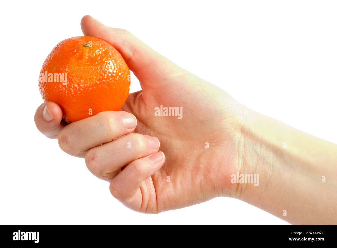 Orange in Hand Stock Photo - Alamy