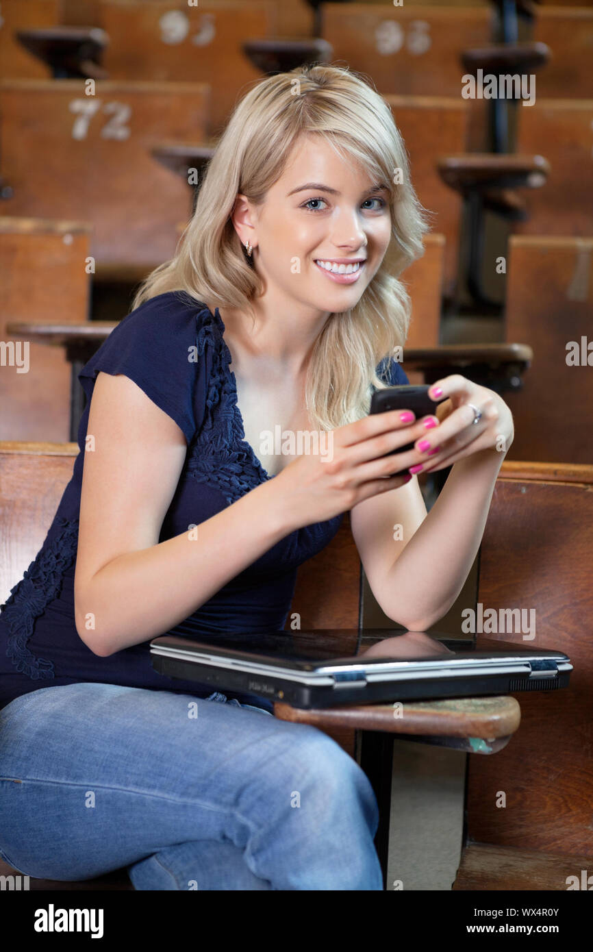 Young teen cell phone classroom hi-res stock photography and images - Alamy