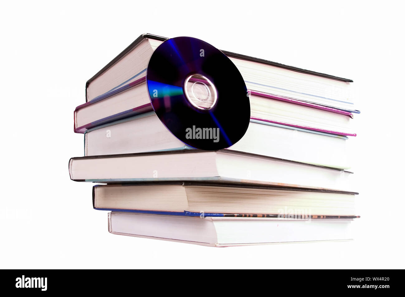 A stack of books with a cd. A concept image for digital books Stock ...