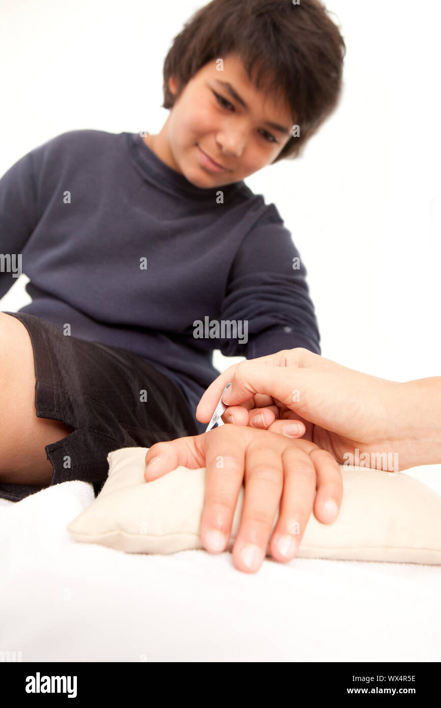 Detail of a Shonishin Heragata Spear being used on a young male patient ...
