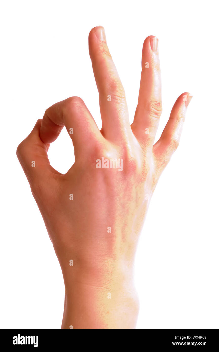 An adult female hand show the 'perfect' sign, with clipping path Stock ...