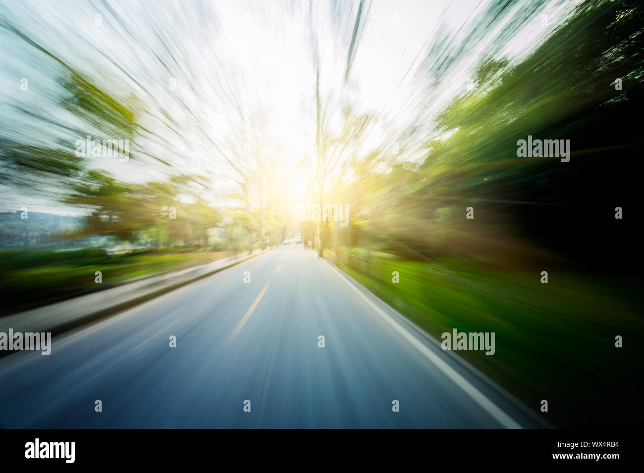 Road in motion blur Stock Photo - Alamy