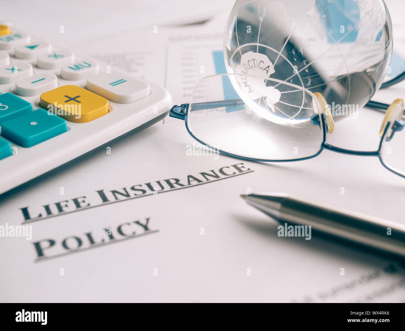 life insurance policy on the desk Stock Photo - Alamy