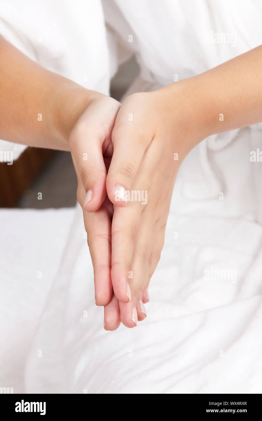 Detail of female hands while relaxing and meditating Stock Photo - Alamy