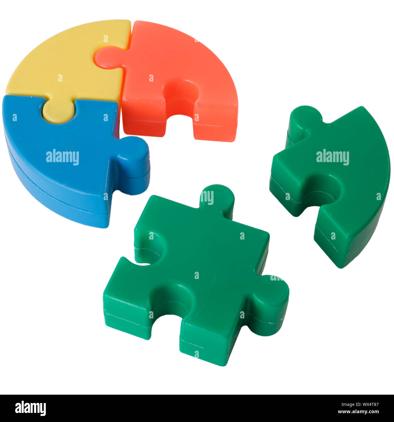 Multi-coloure slices plastic puzzle on the white background Stock Photo ...