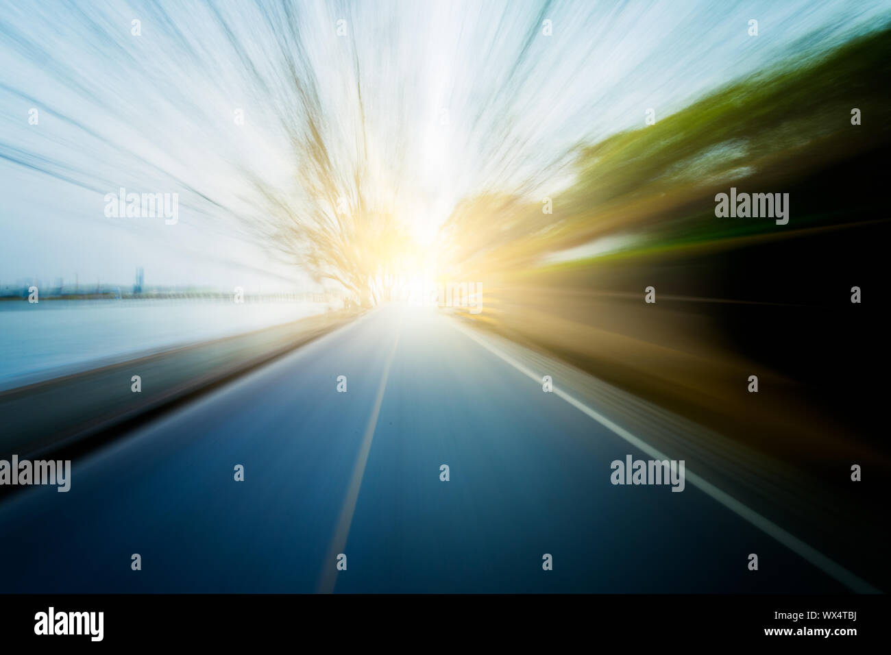 Road in motion blur Stock Photo - Alamy