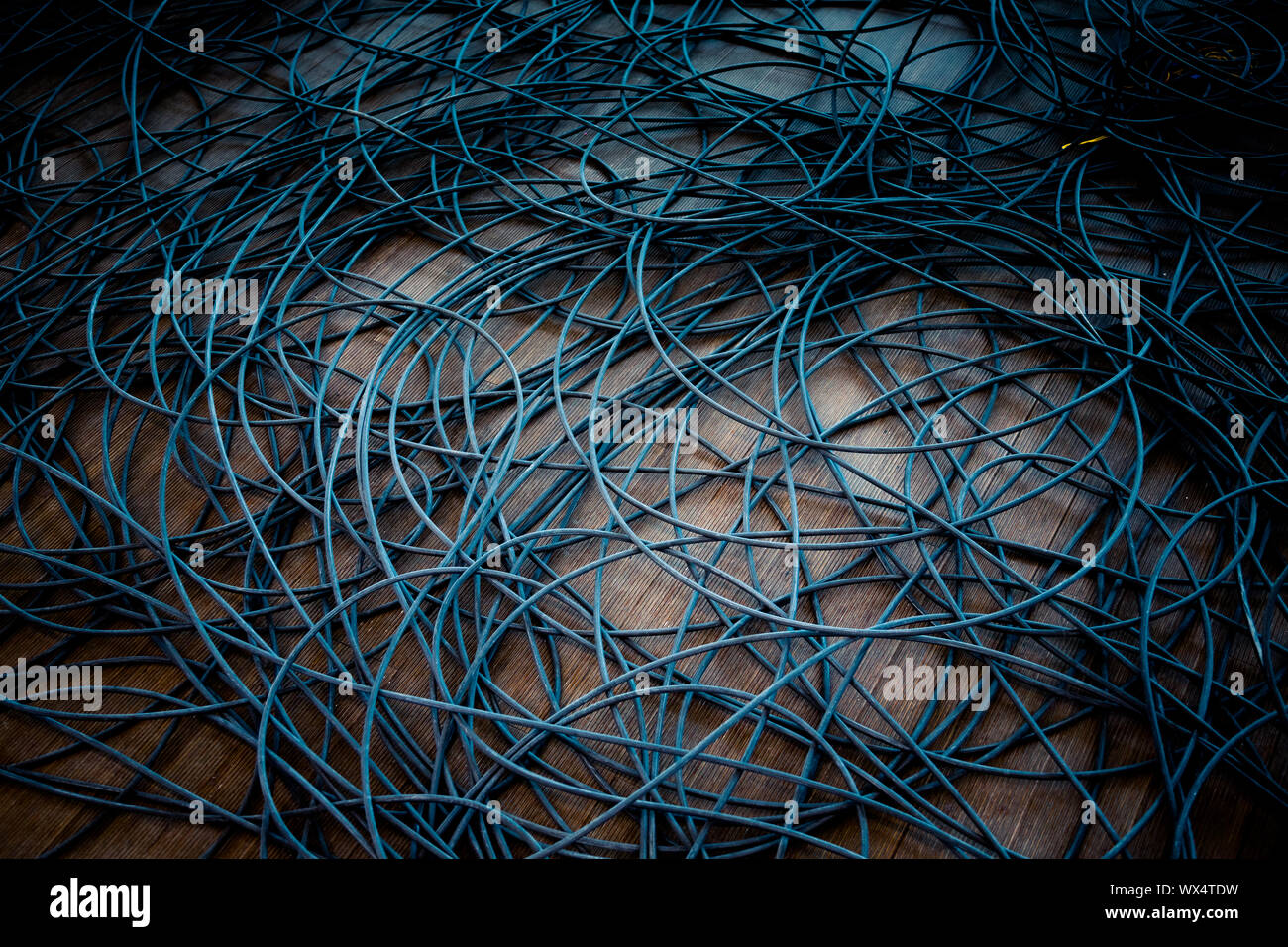 Network chaos of colorful cables Stock Photo - Alamy