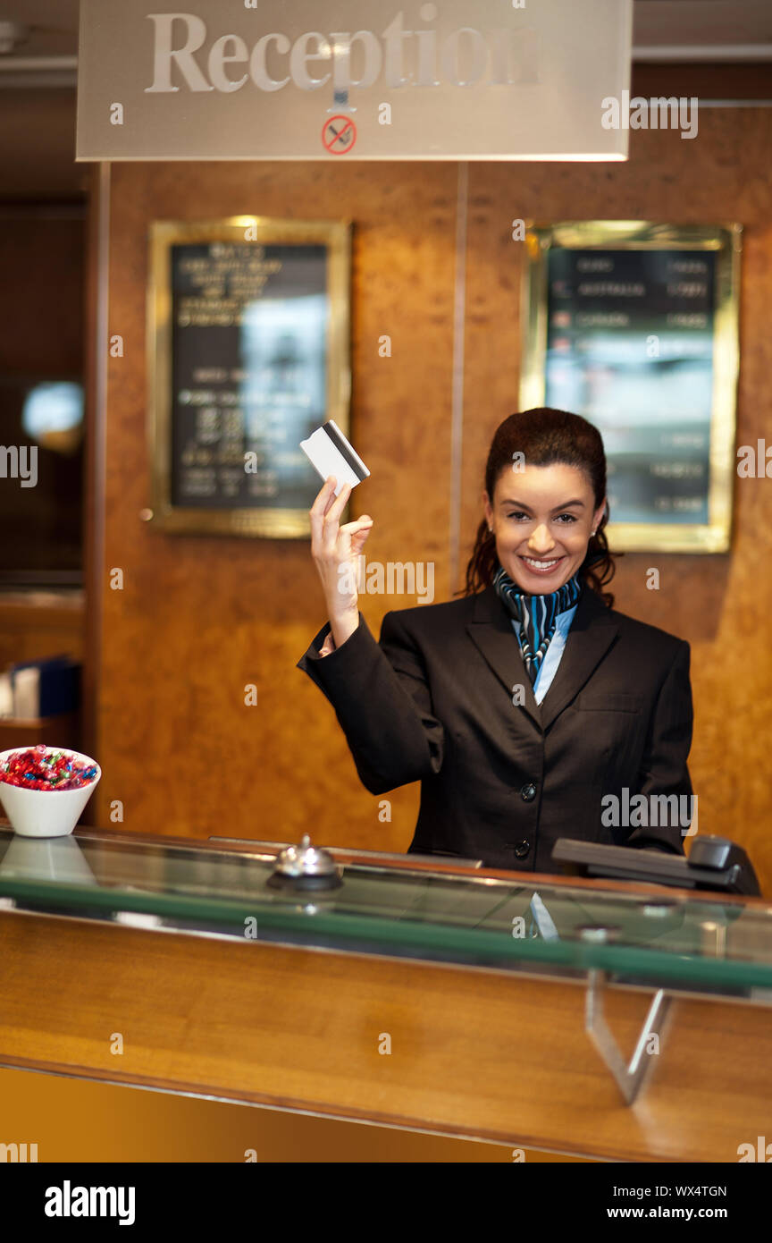 Gorgeous receptionist hi-res stock photography and images - Alamy