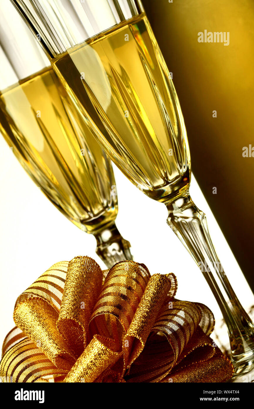 holiday card golden champagne and gift Stock Photo - Alamy