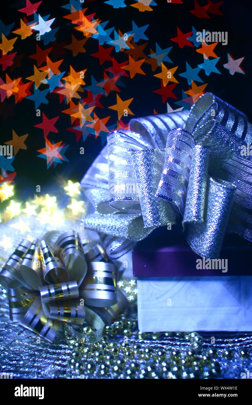 holiday gifts background warm stars Stock Photo - Alamy