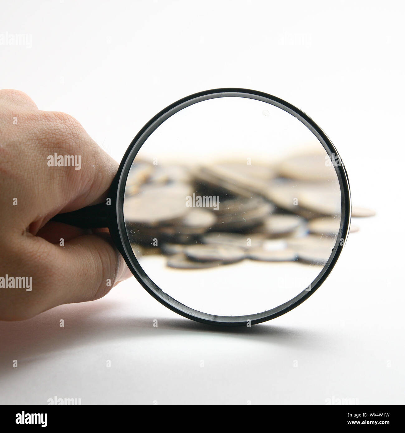 magnifier in men hand isolated Stock Photo - Alamy