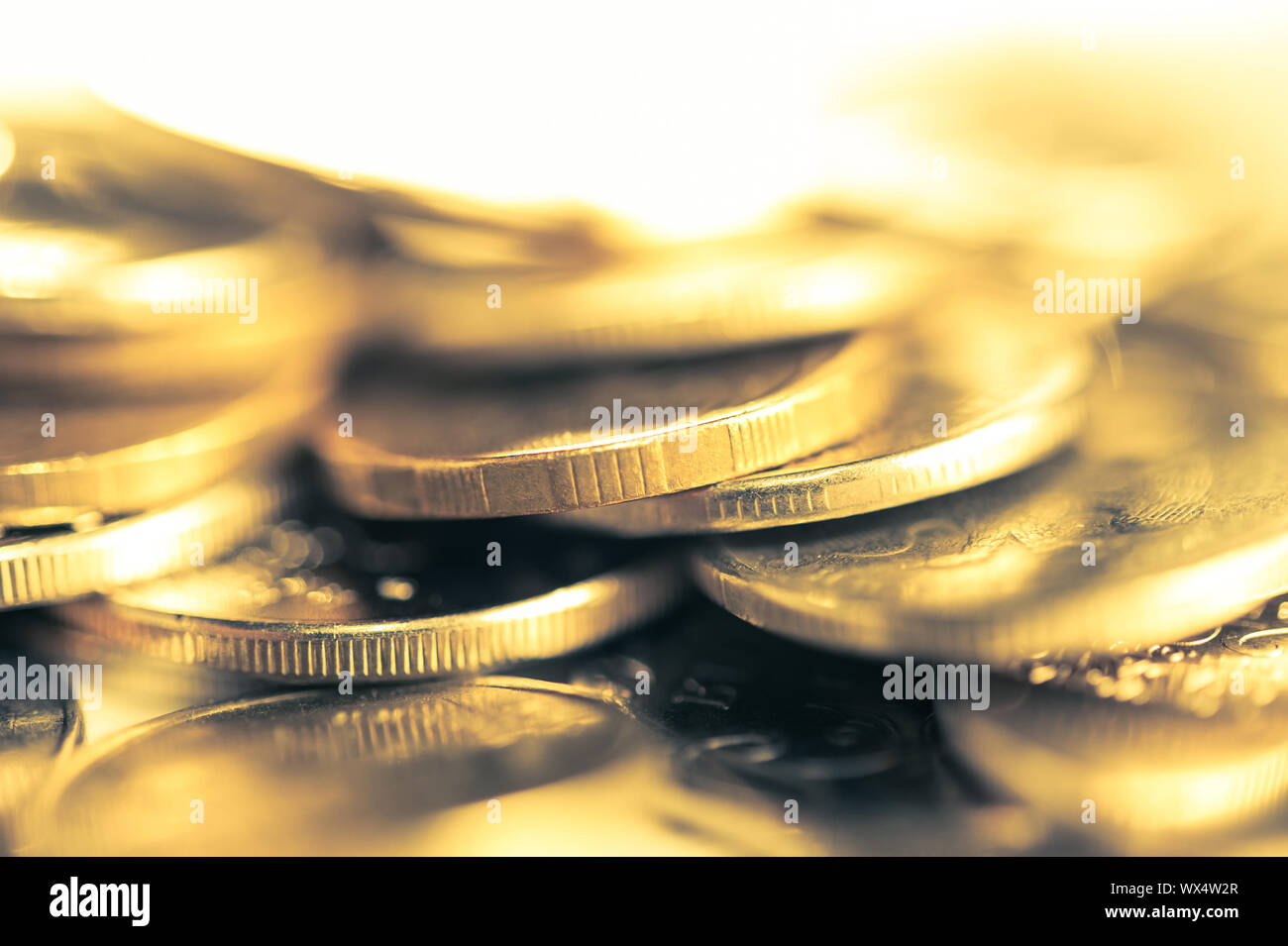 Stack of golden coins macro. Rows of coins for finance and banking ...