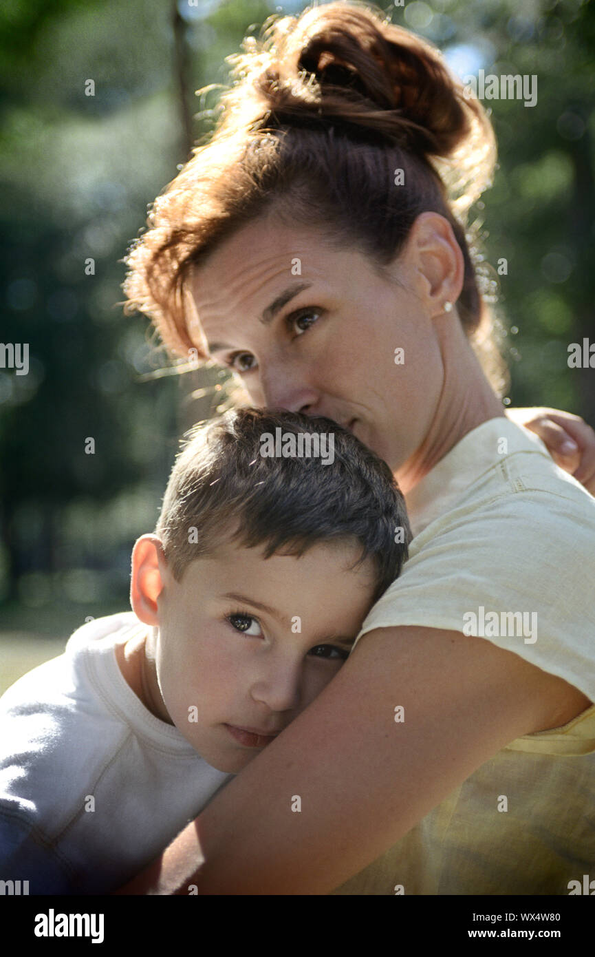 A mother comforting her small child Stock Photo - Alamy