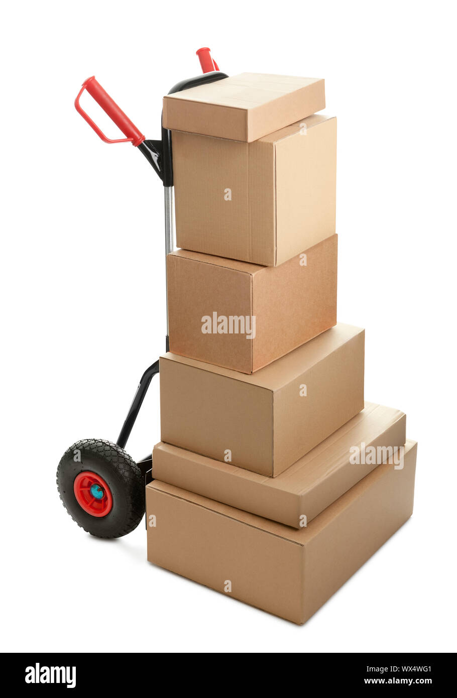 Large dolly with brown shipping boxes isolated on white background ...