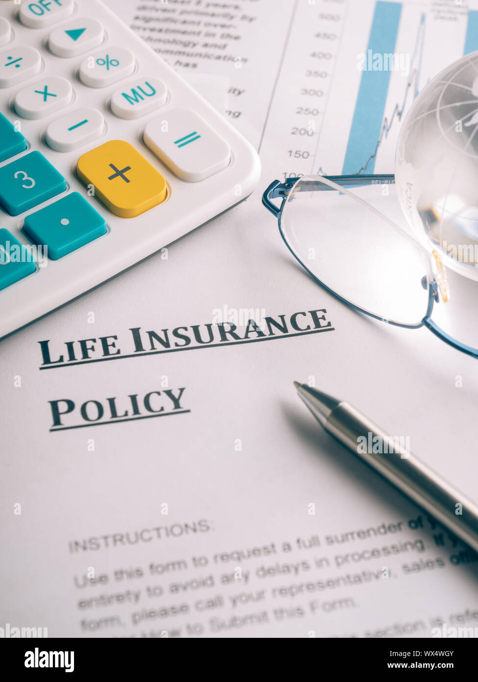 life insurance policy on the desk Stock Photo - Alamy