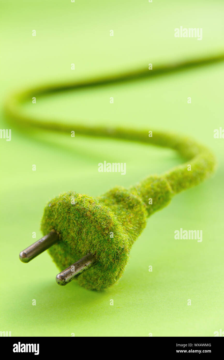 abstract image of green electric plug Stock Photo - Alamy