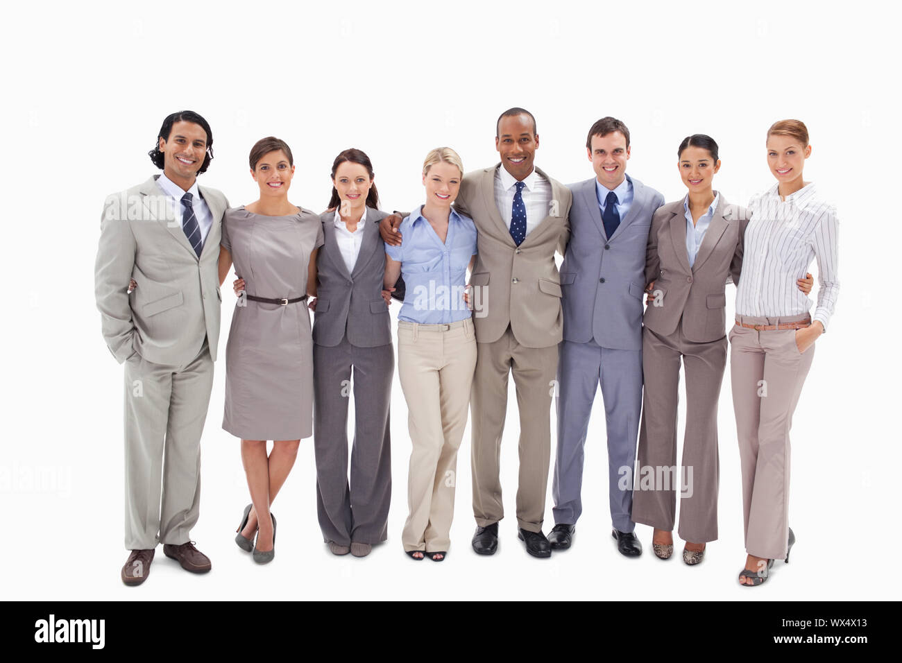 Business team arm in arm against white background Stock Photo - Alamy