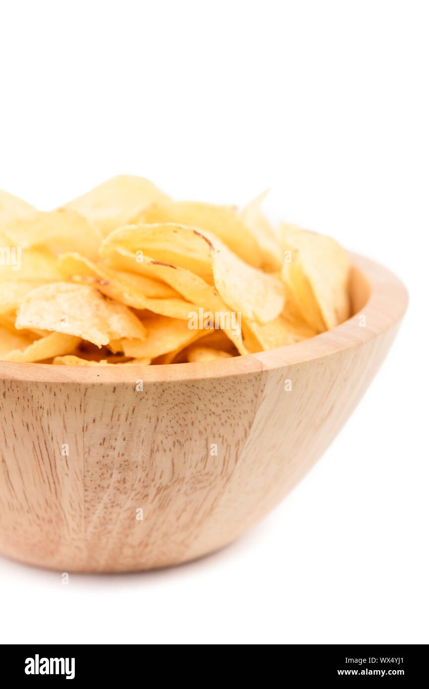 Crisps in a bowl against white background Stock Photo - Alamy