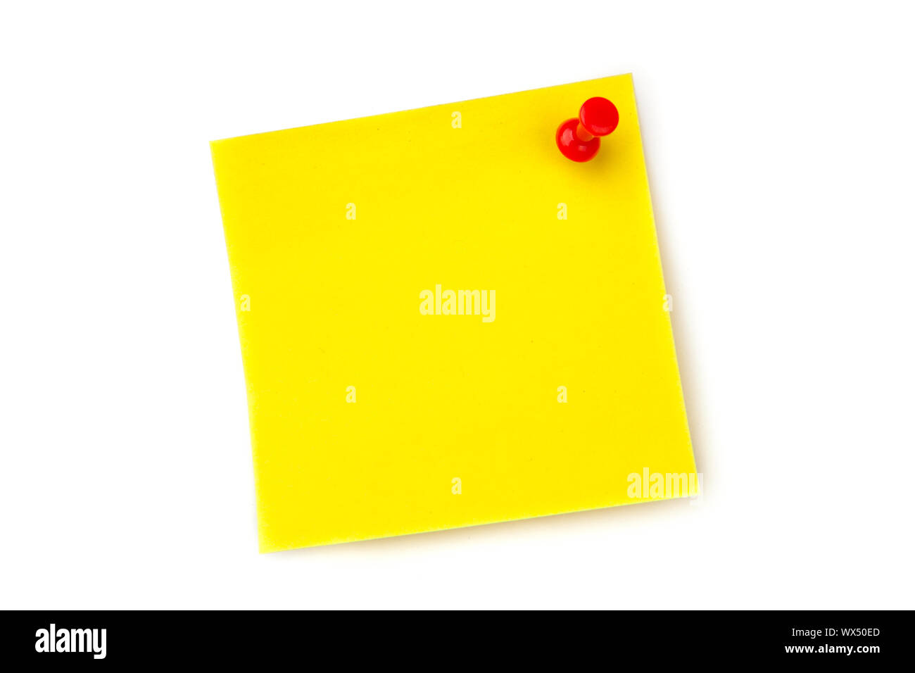 Yellow pinned adhesive note against a white background Stock Photo - Alamy