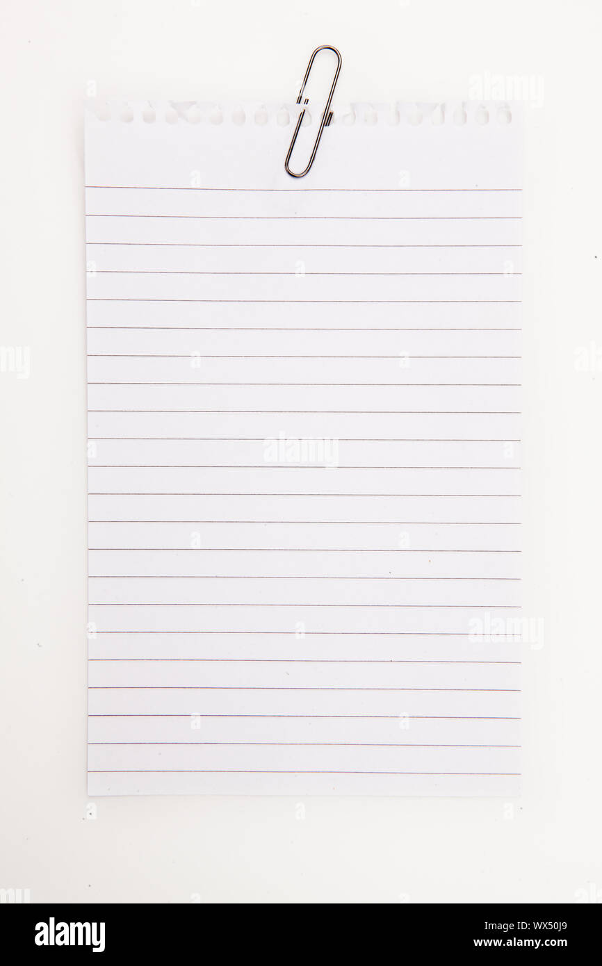 Blank page with grey paperclip against a white background Stock Photo ...