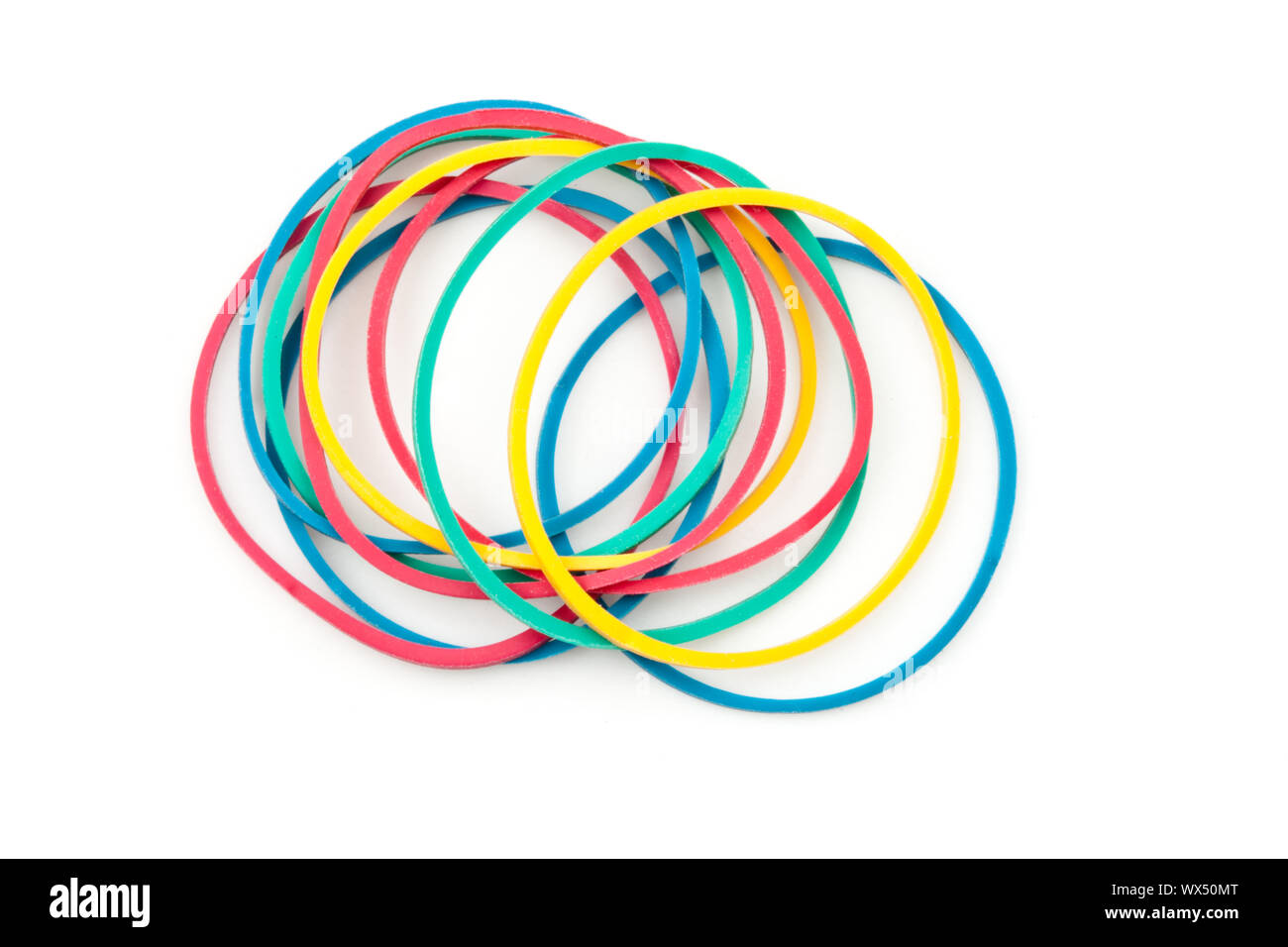 Group of multi coloured elastics against a white background Stock Photo ...