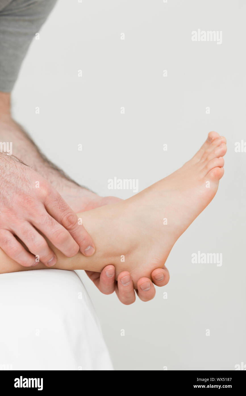 Foot held hi-res stock photography and images - Alamy