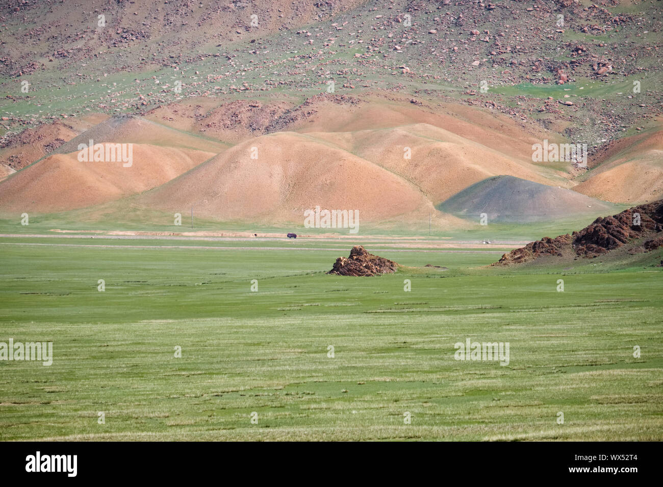 Mongolian mountain natural landscapes with eroded foothill slopes near ...