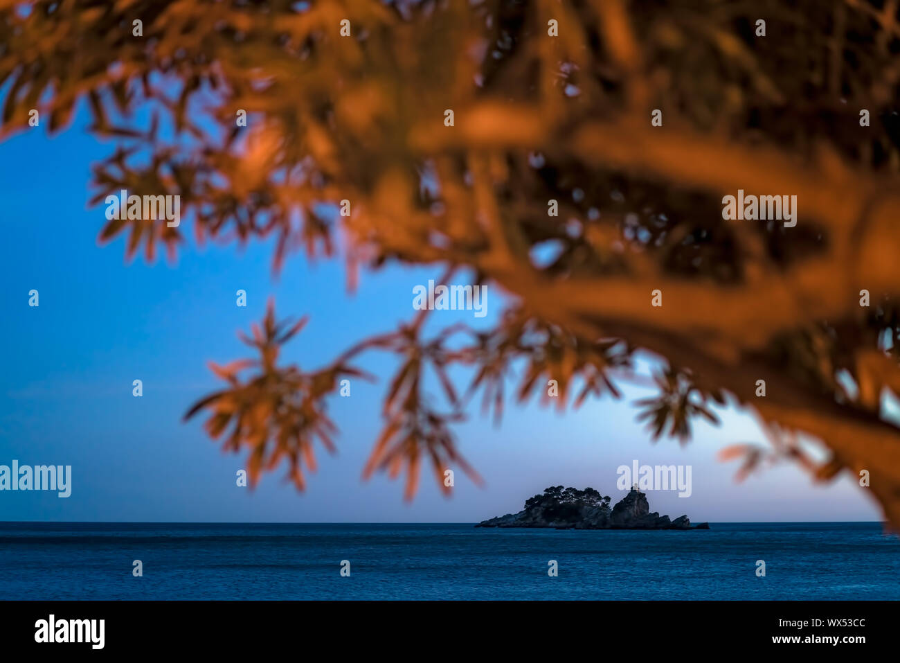 Small secluded monastery in Petrovac bay Stock Photo - Alamy