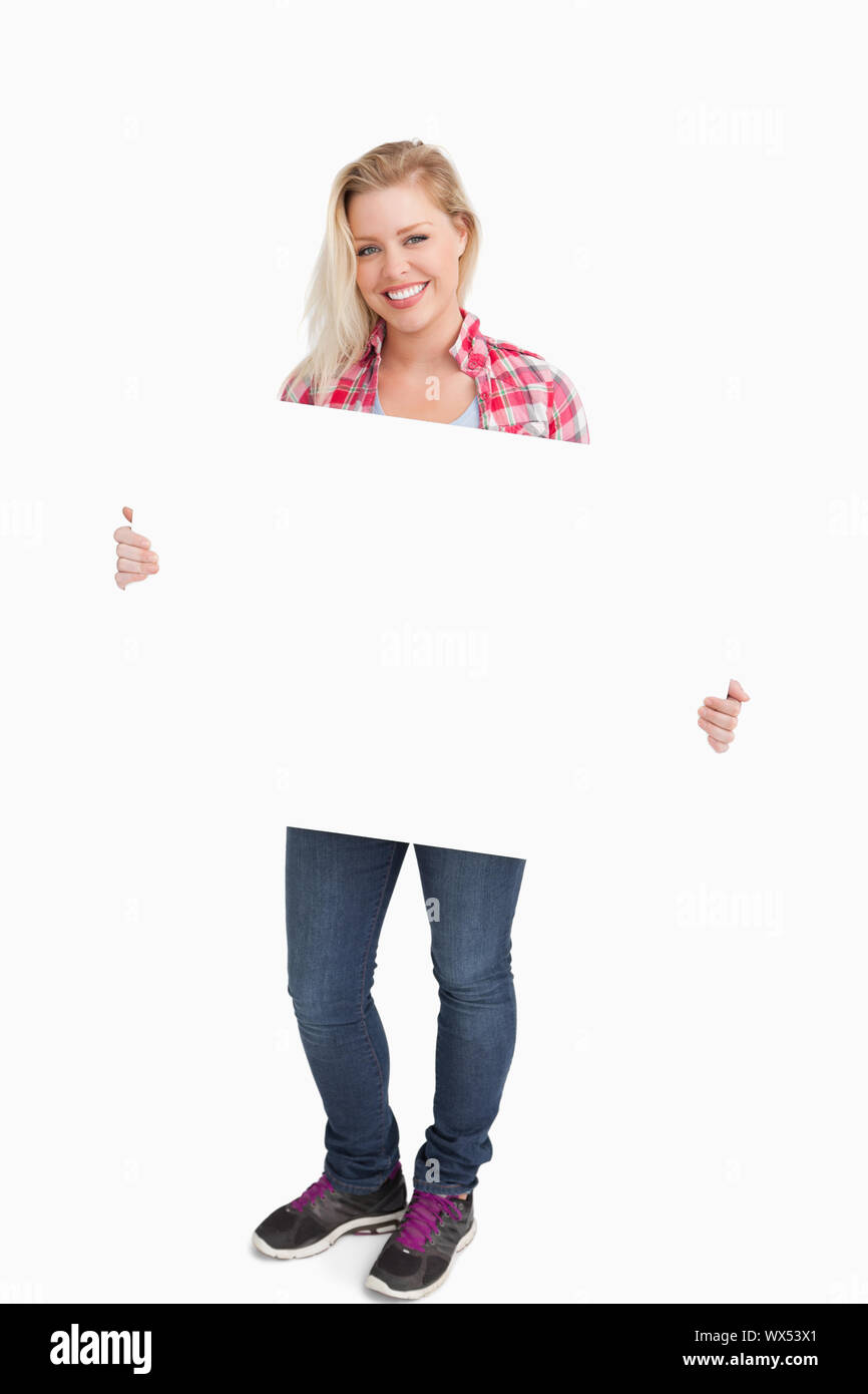 Young pretty woman holding placard Cut Out Stock Images & Pictures - Alamy