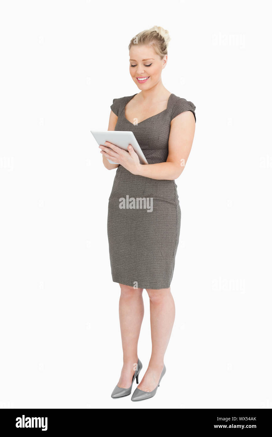Female reading a tablet Cut Out Stock Images & Pictures - Alamy