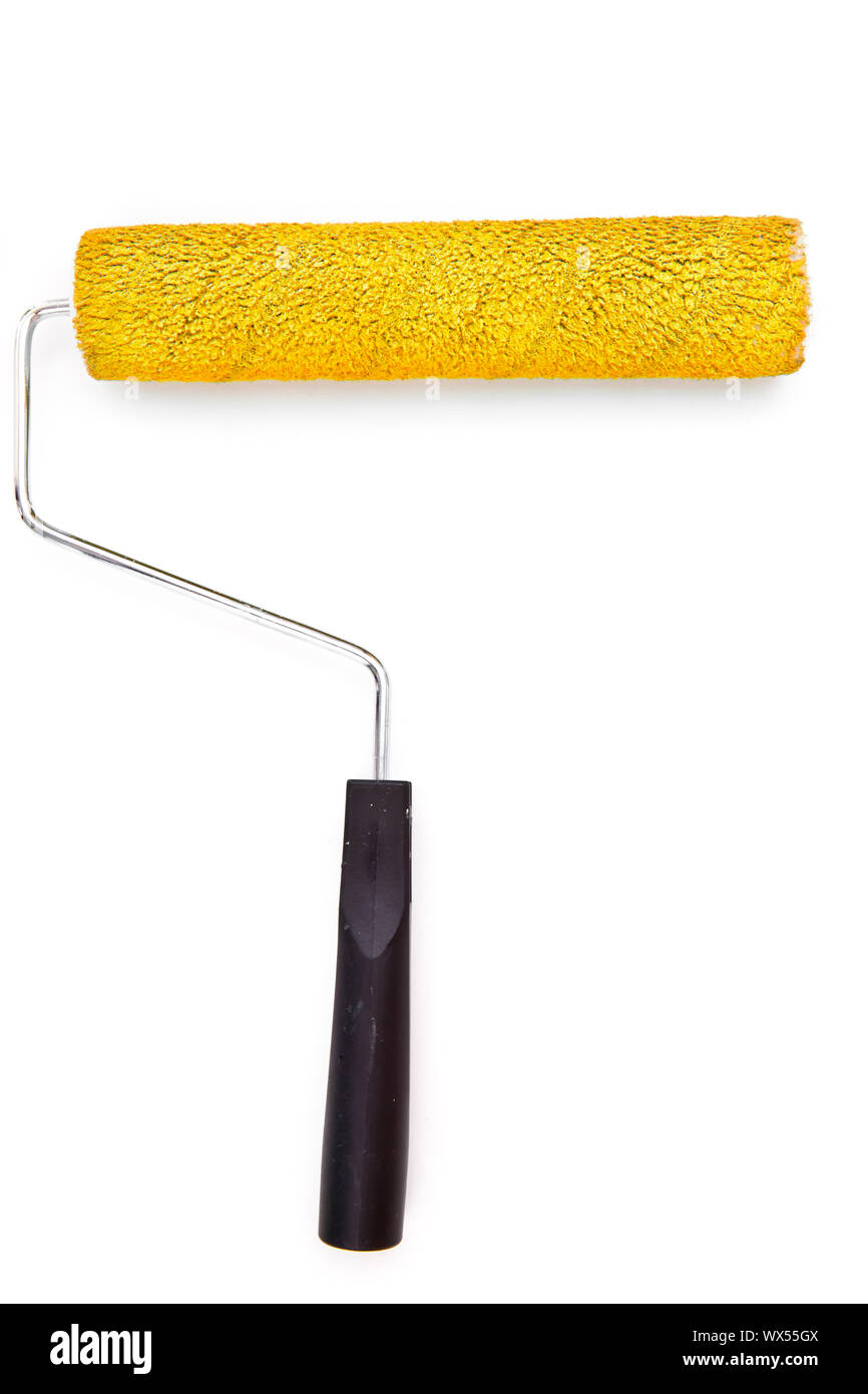 Yellow paint roller on white background Stock Photo - Alamy