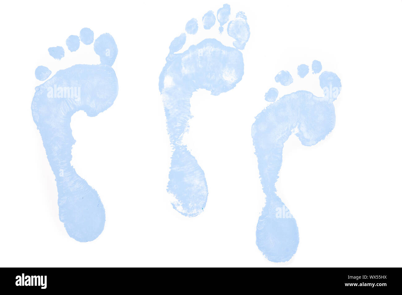 Three blue footprints against a white background Stock Photo - Alamy