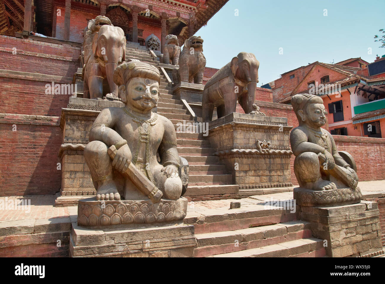Ancient statues in old Bhaktapur city Stock Photo - Alamy