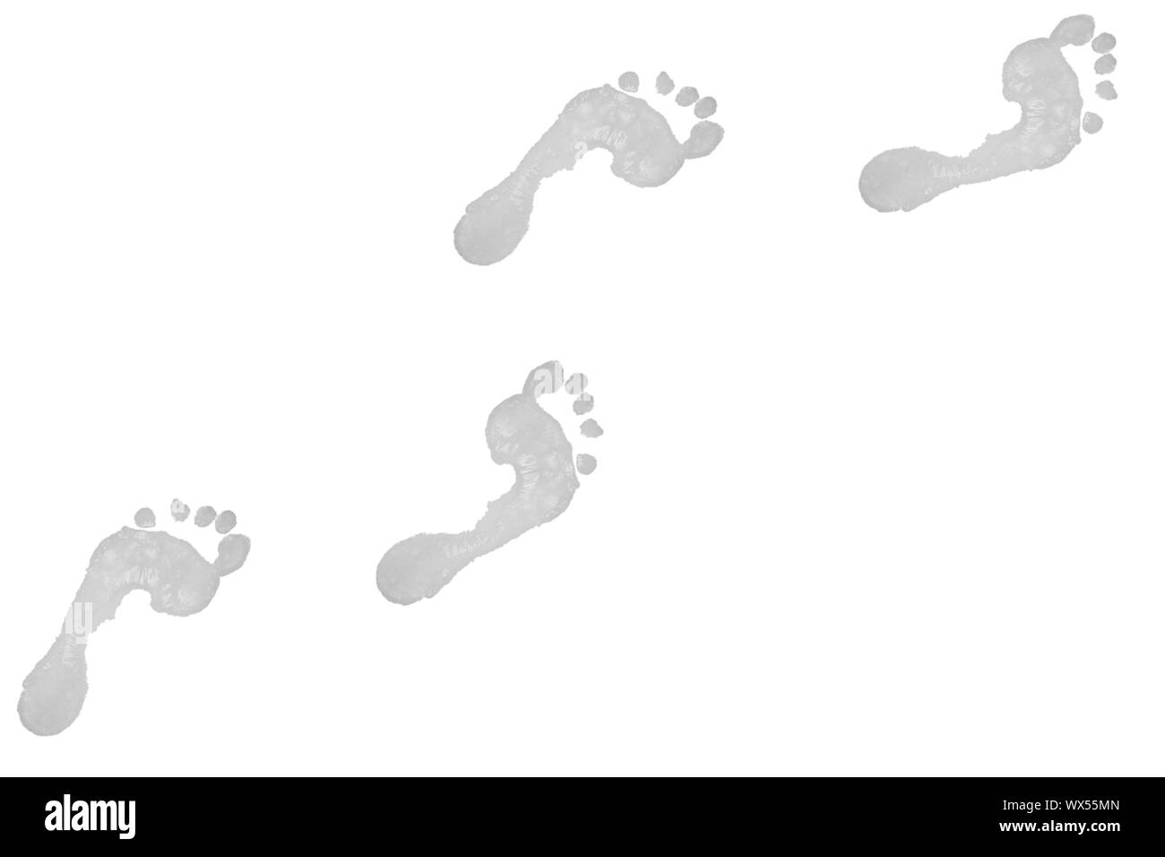 Four grey footprints against a white background Stock Photo - Alamy